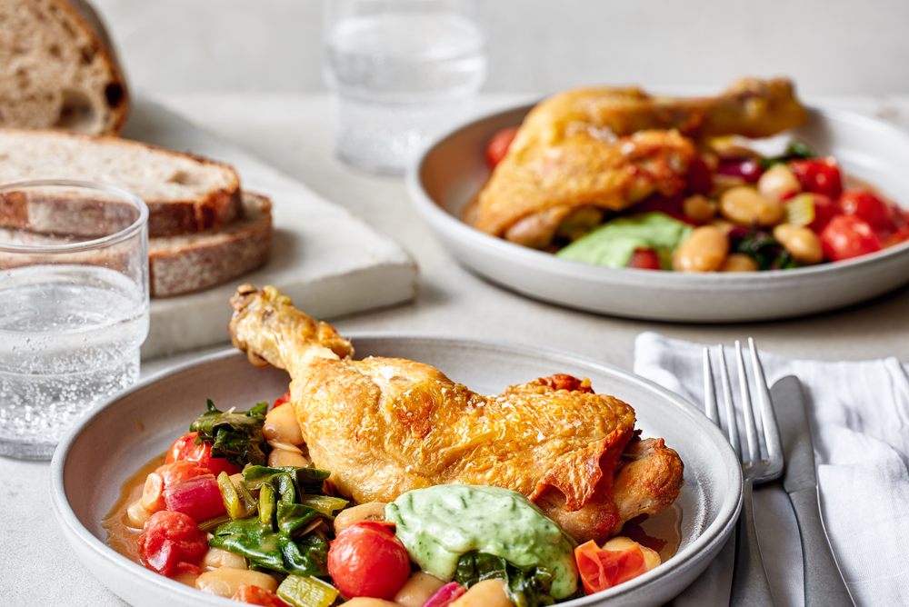 Crispy roast chicken with tomatoey butter beans recipe - Waitrose UAE ...